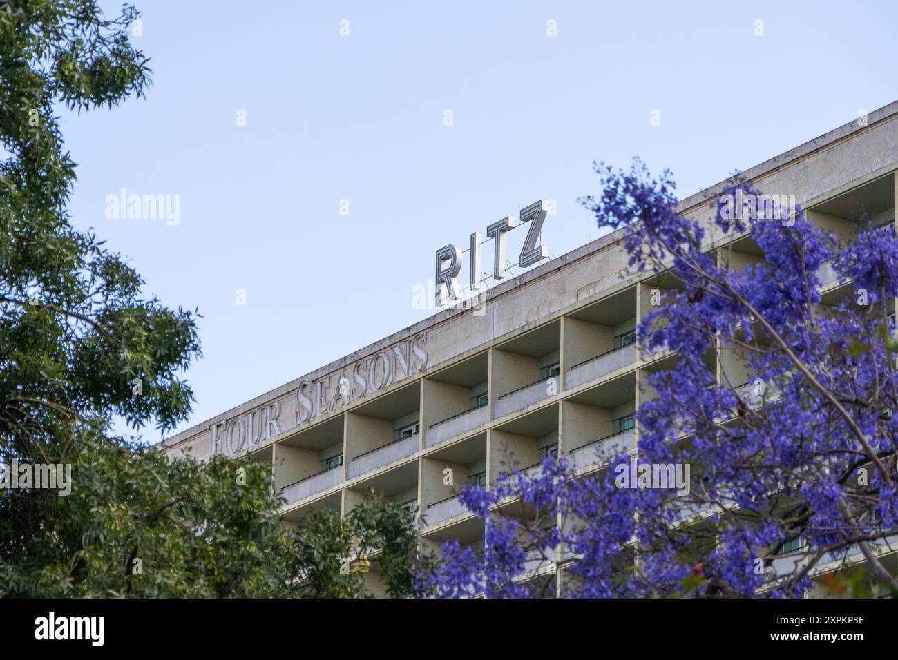 The four seasons hotel ritz lisbon facade with its iconic sign and a ...