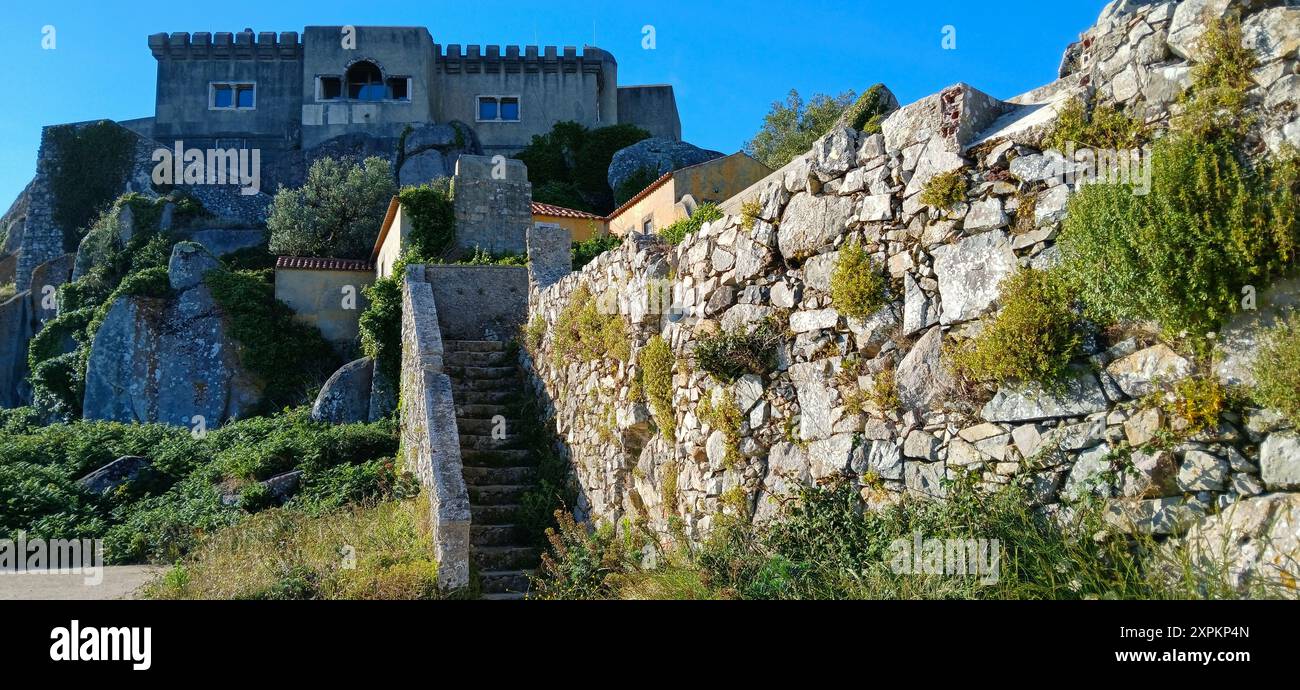 Stone stairs leading up to a historic castle on a mountain top ...