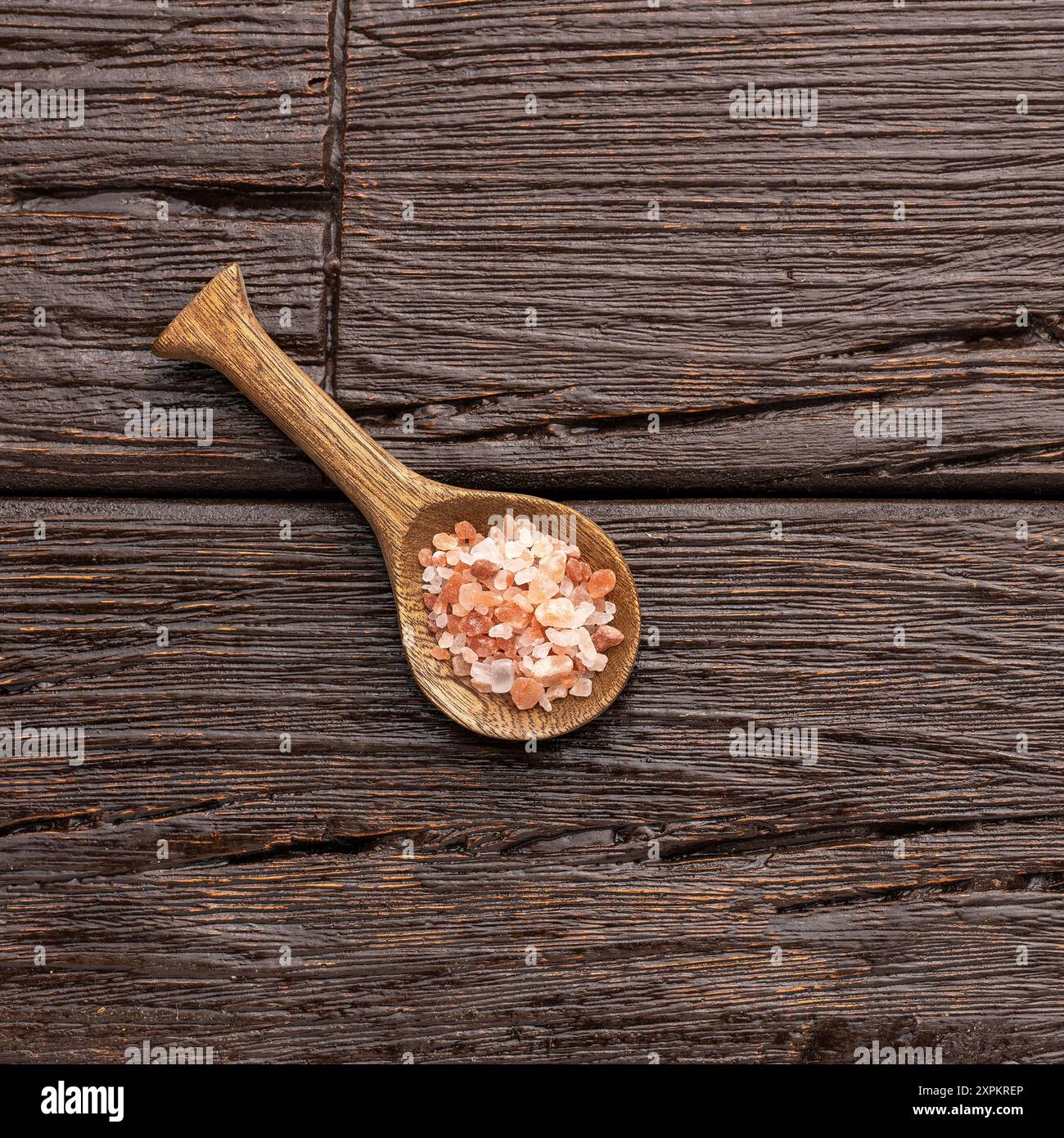 Organic Himalayan pink rock salt in spoon - Healthy food ingredient ...