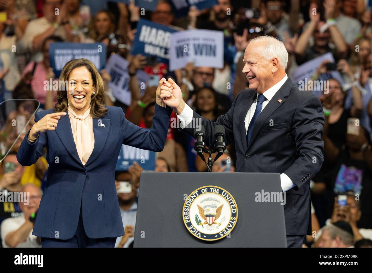 Kamala Harris and Tim Walz on stage at the rally in Liacouras Center at ...