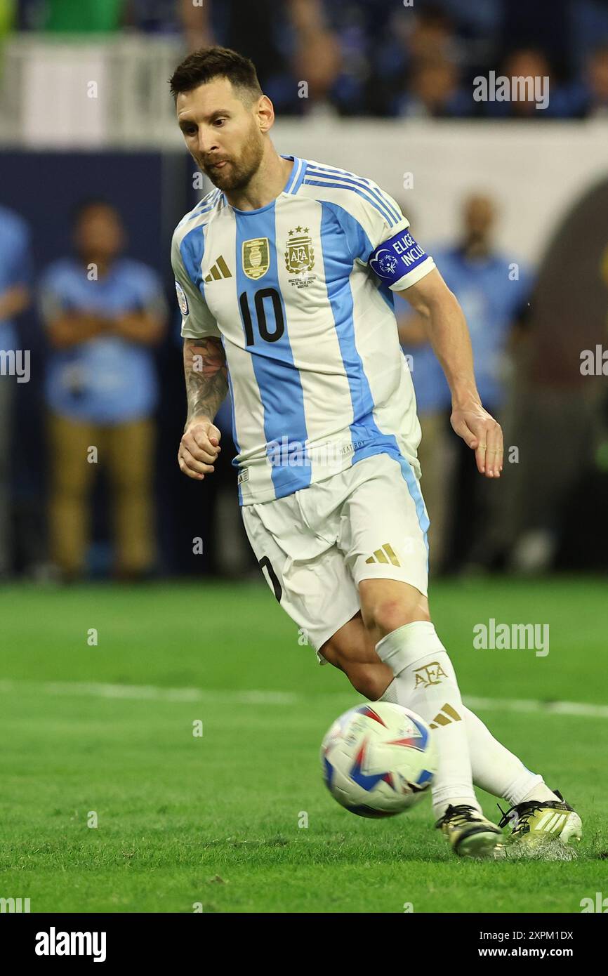Argentina's forward Lionel Messi shots a penalty kick against Ecuador ...