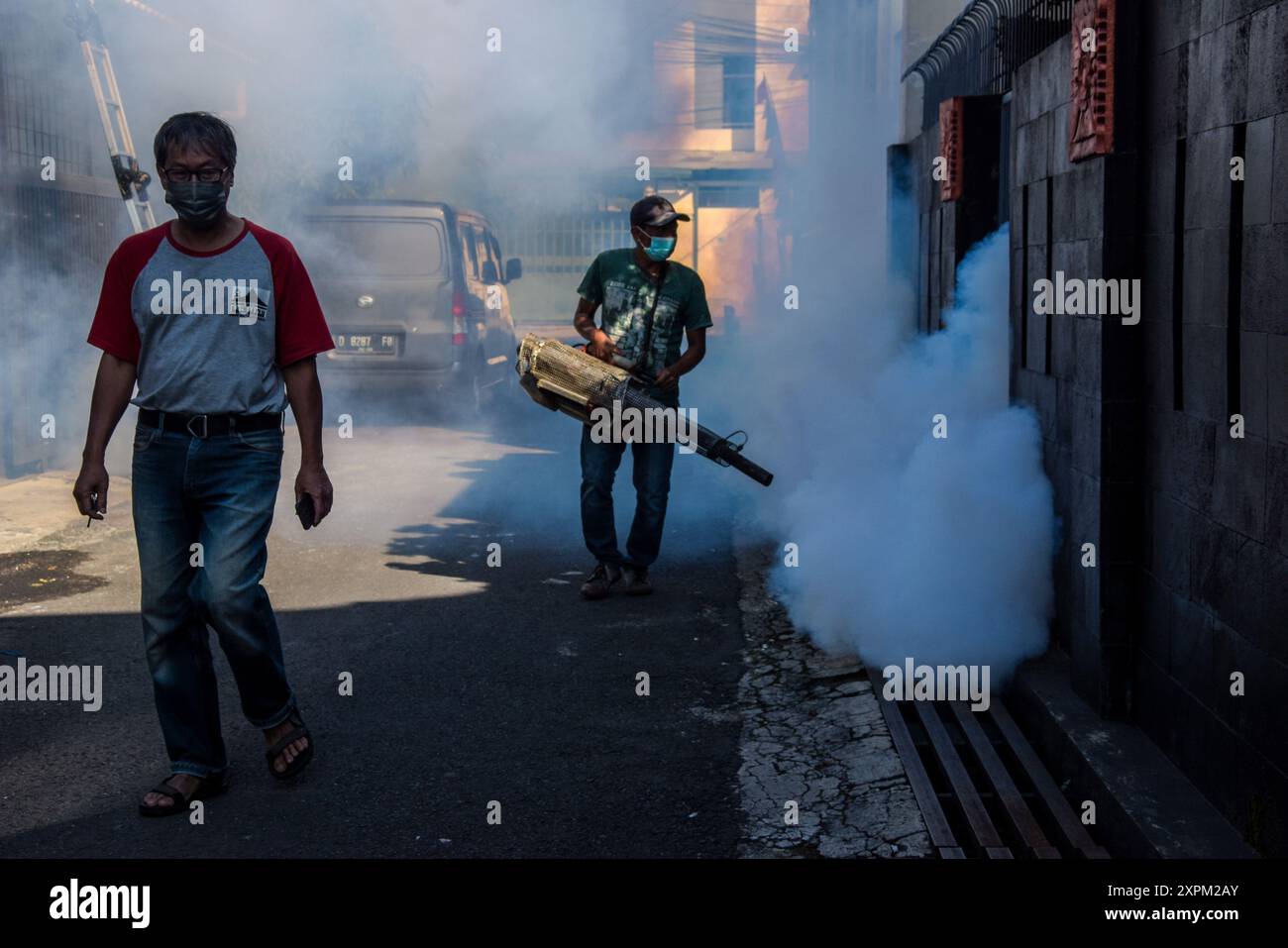 Bandung, West Java, Indonesia. 7th Aug, 2024. A worker fumigates with ...