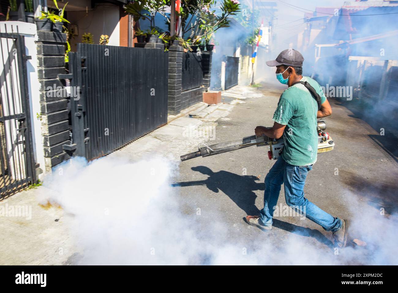 Bandung, West Java, Indonesia. 7th Aug, 2024. A worker fumigates with ...