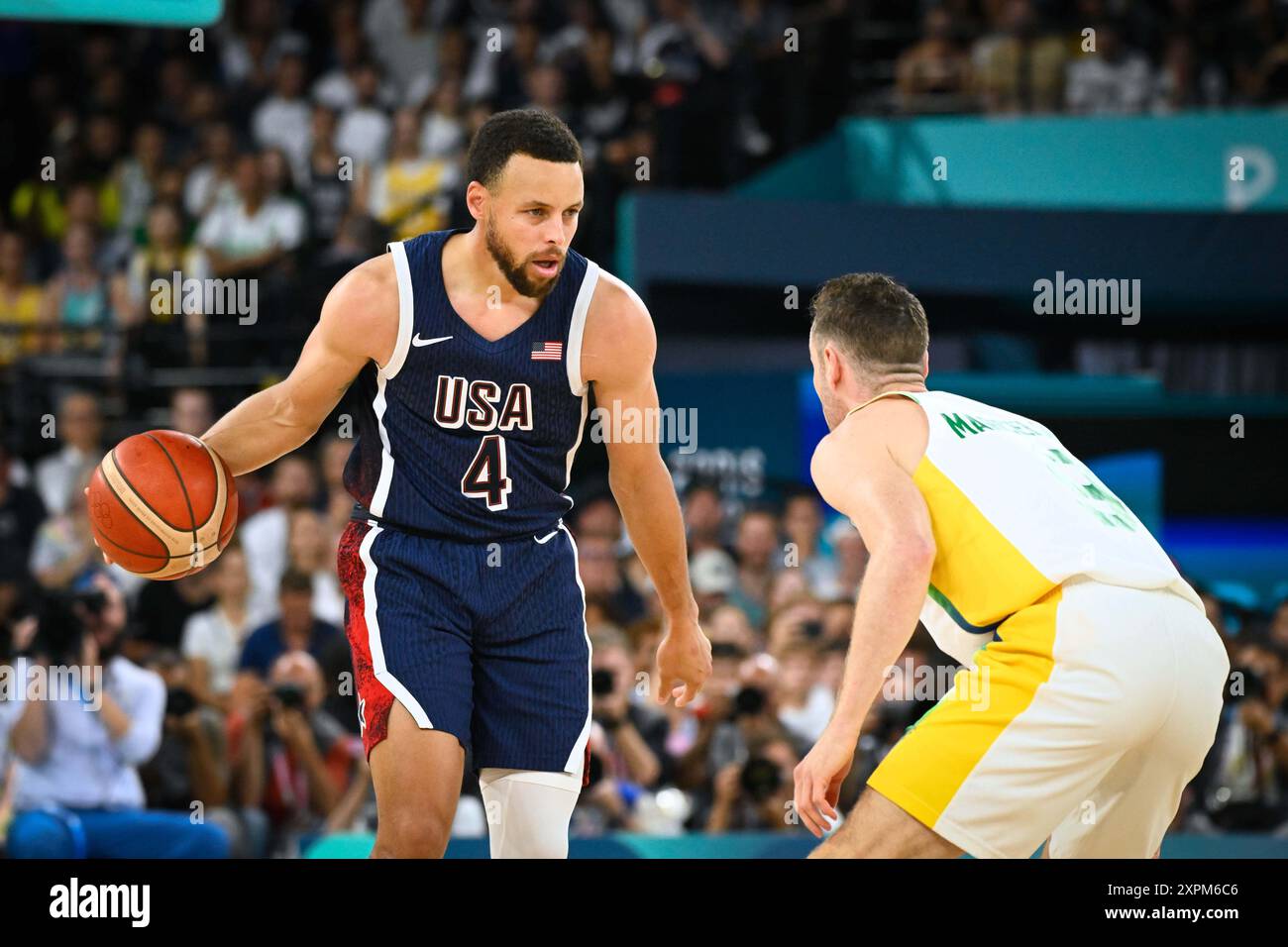 Paris, France. 06th Aug, 2024. Stephen Curry of USA and Marcelinho ...