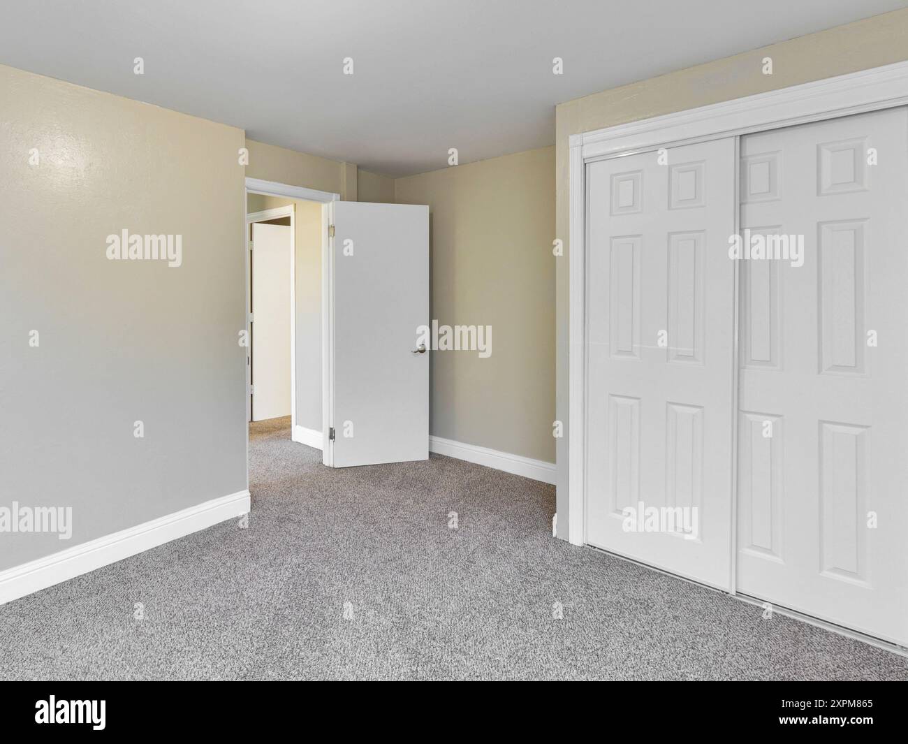 Modern residential empty bedroom interior Stock Photo - Alamy