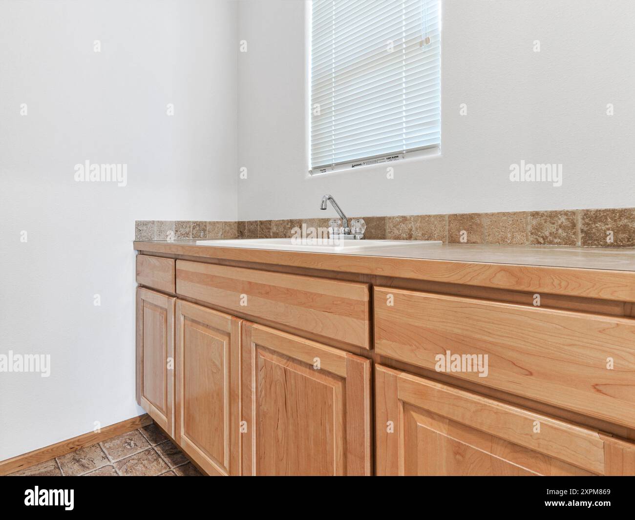 Modern residential empty laundry room interior Stock Photo - Alamy
