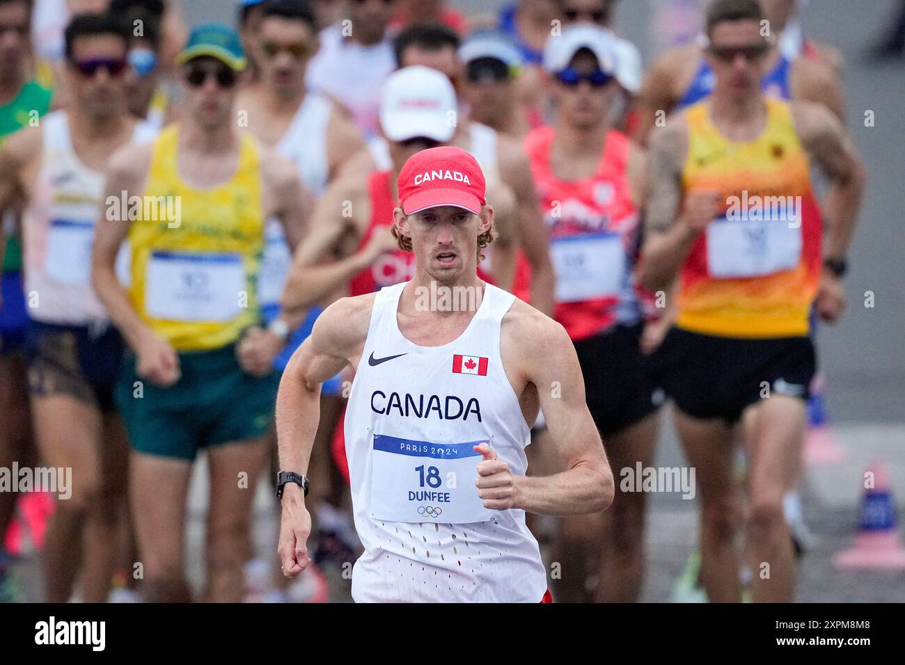 Canada's Evan Dunfee leads the pack during the marathon race walk relay ...
