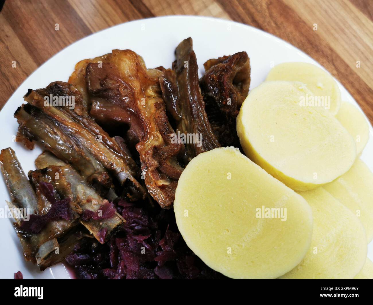 pork meat with red cabbage and dumplings as czech national food Stock ...
