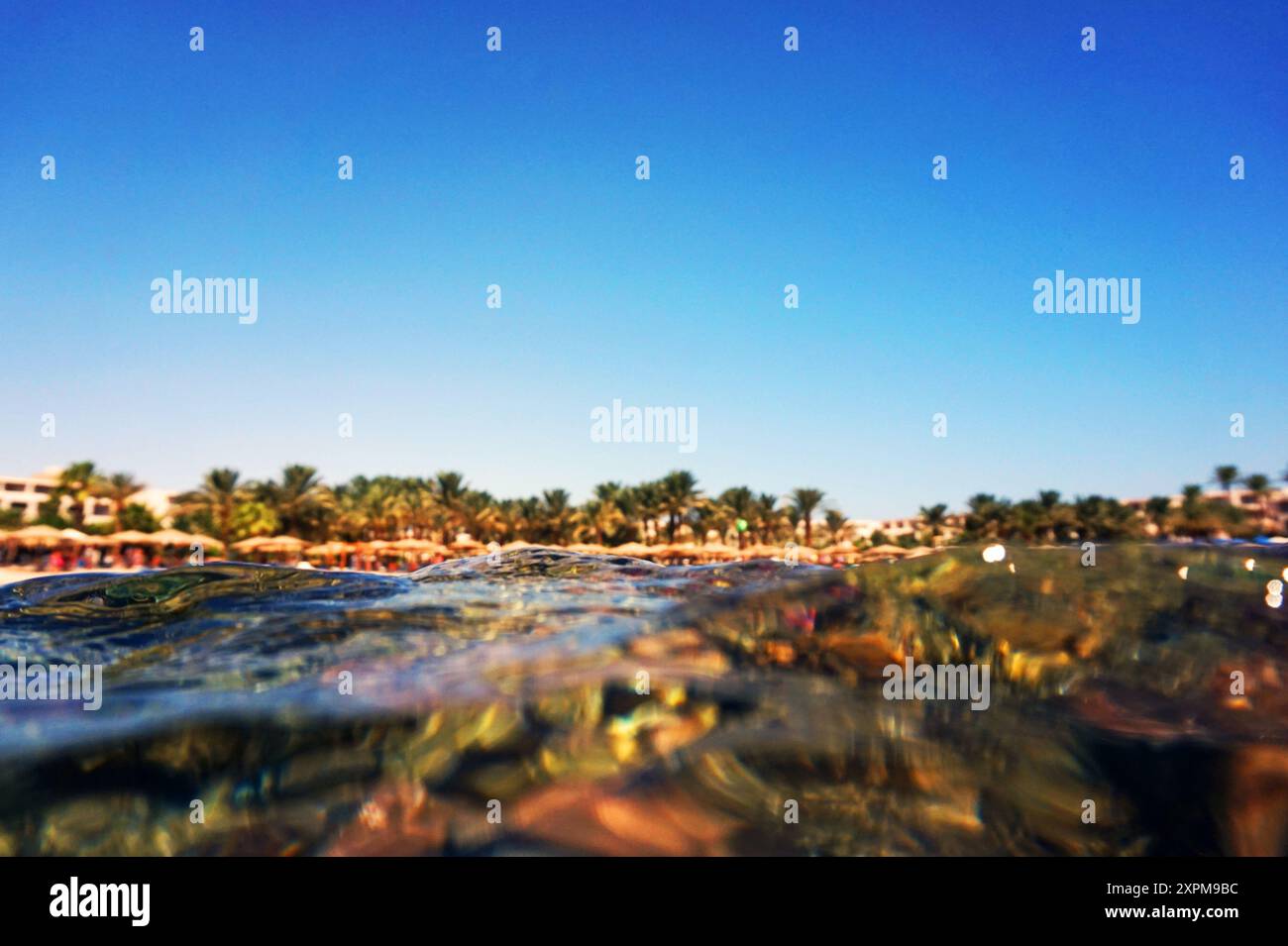Makadi bay beach in the Egypt with blue sea Stock Photo - Alamy
