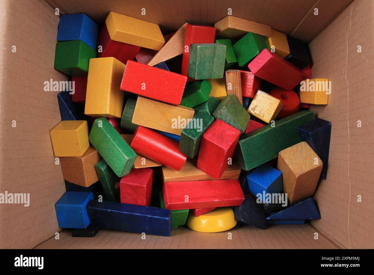 wooden color 3d shapes in the box Stock Photo - Alamy