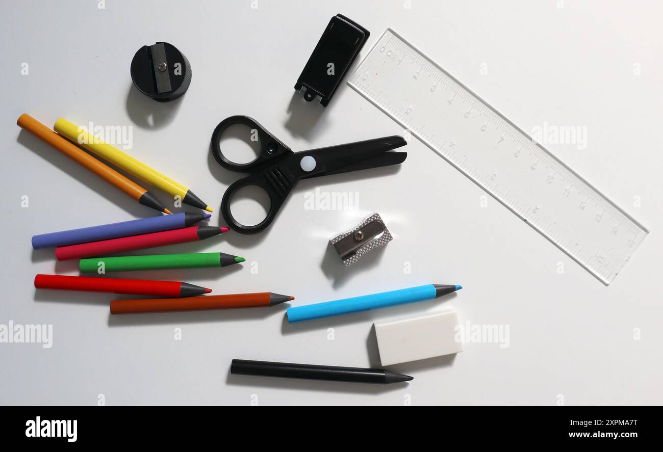 Photo of office equipment. Scattered randomly on a white background ...