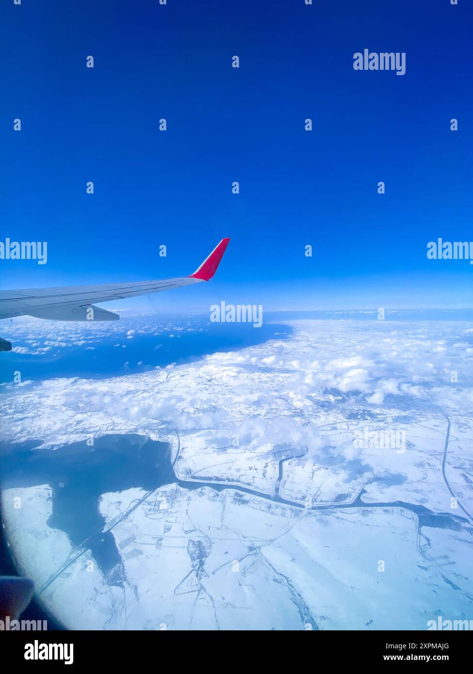 Aerial view from the window of airplane on winter landscape Stock Photo ...
