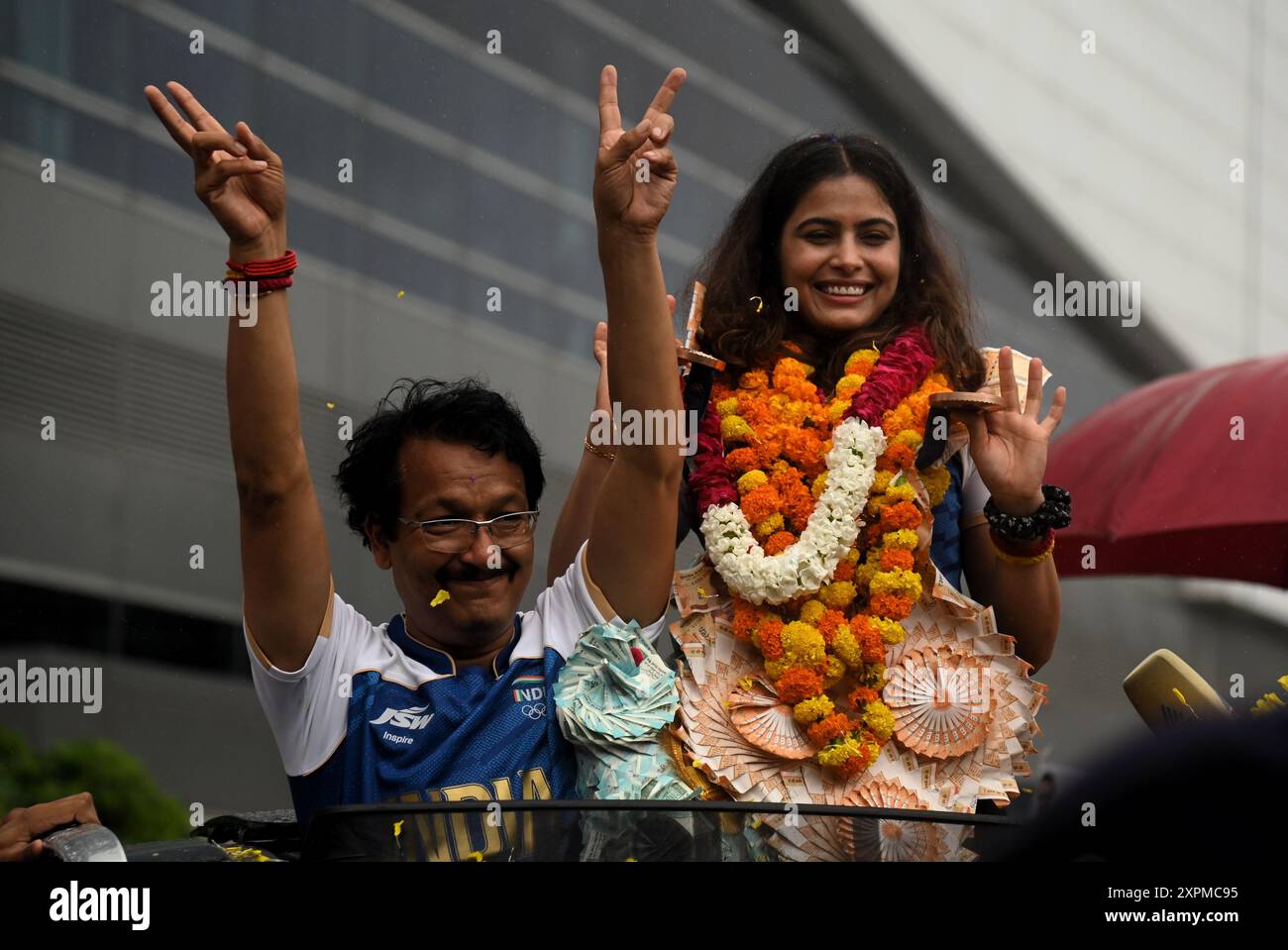 Delhi, New Delhi, India. 7th Aug, 2024. India's shooter Manu Bhaker (C ...