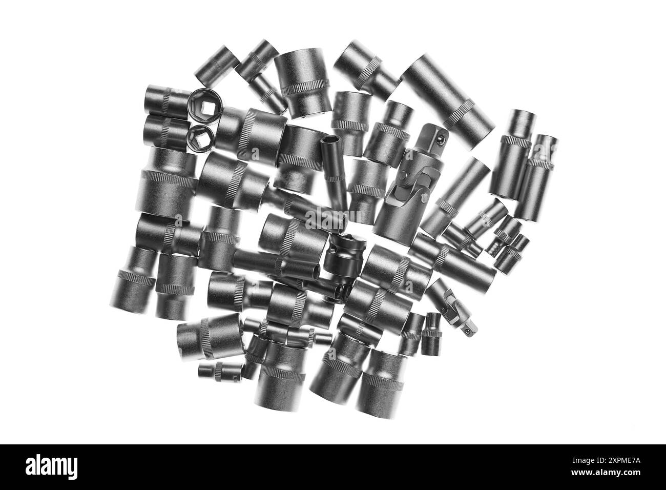 Pile of spark plug sockets on white background, top view. Auto mechanic ...