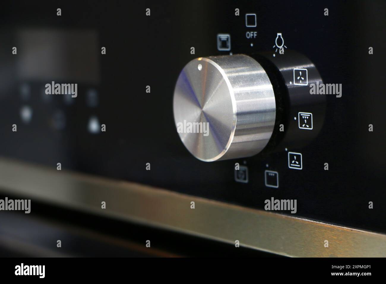 Oven knob controller with multi-function settings from side view Stock ...