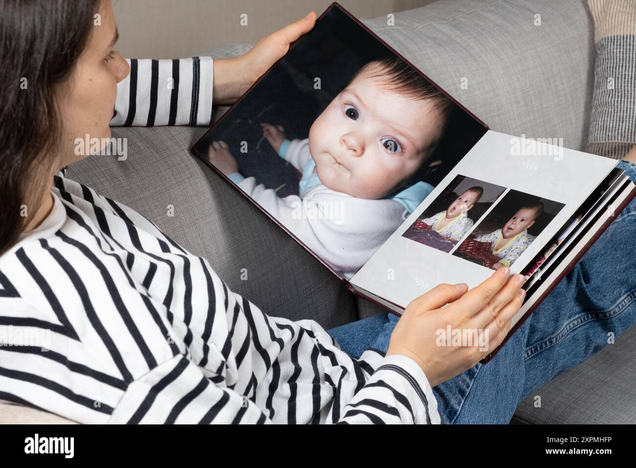 Baby boy looking picture book hi-res stock photography and images - Alamy
