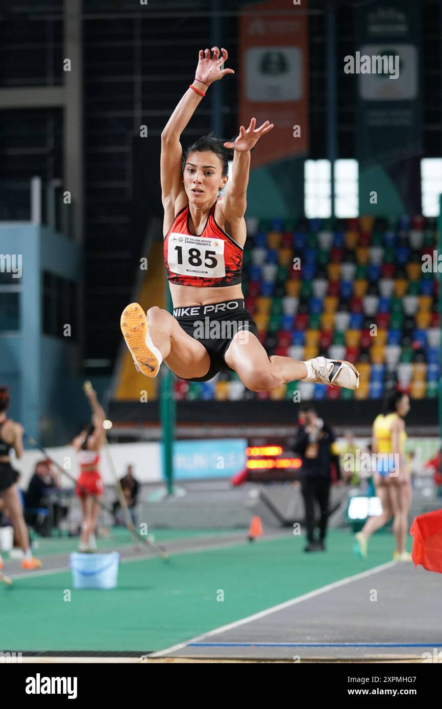 ISTANBUL, TURKIYE - FEBRUARY 10, 2024: Undefined athlete long jumping ...