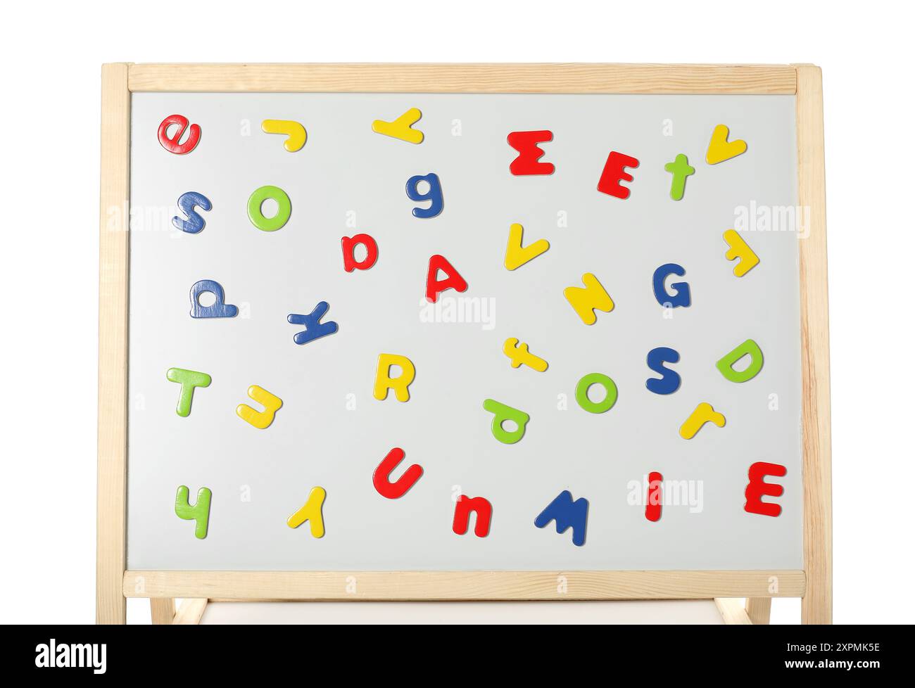 Learning alphabet. Magnetic letters on board against white background ...