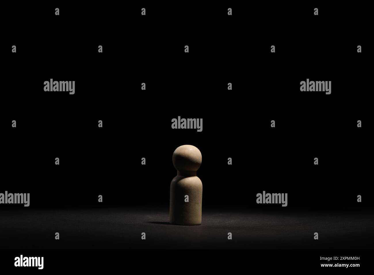 Loneliness concept. Human figure in darkness alone Stock Photo - Alamy