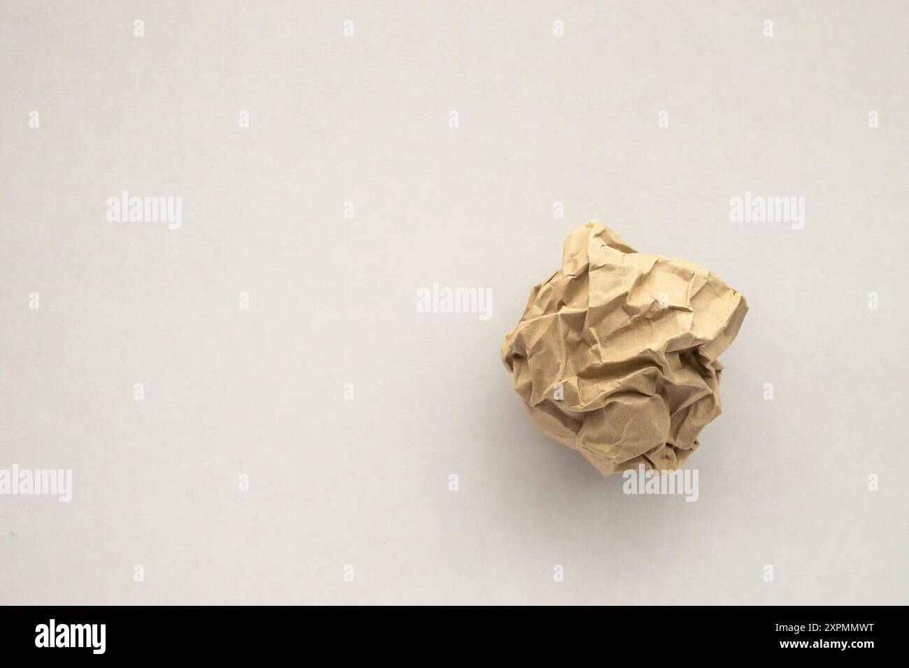 Crumpled recycle brown paper ball Stock Photo - Alamy