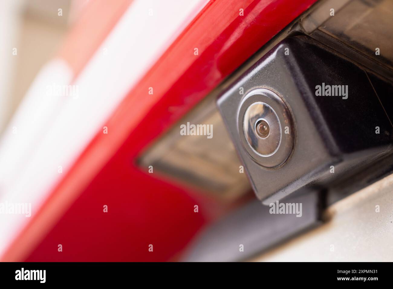 Red car rear view camera close up for parking assistance Stock Photo ...