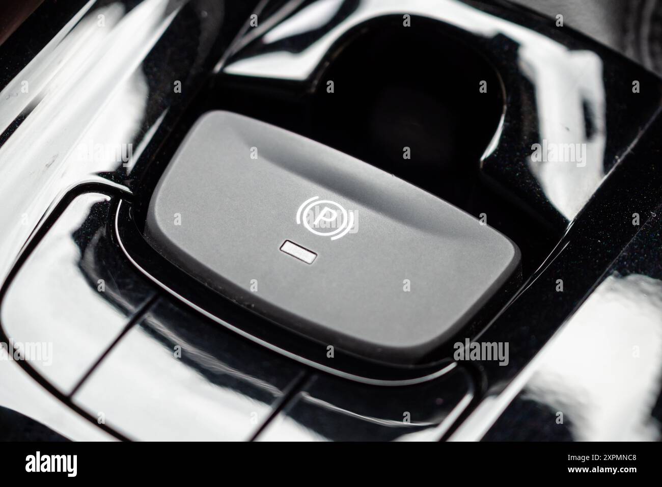 electronic handbrake button in luxury modern car Stock Photo - Alamy