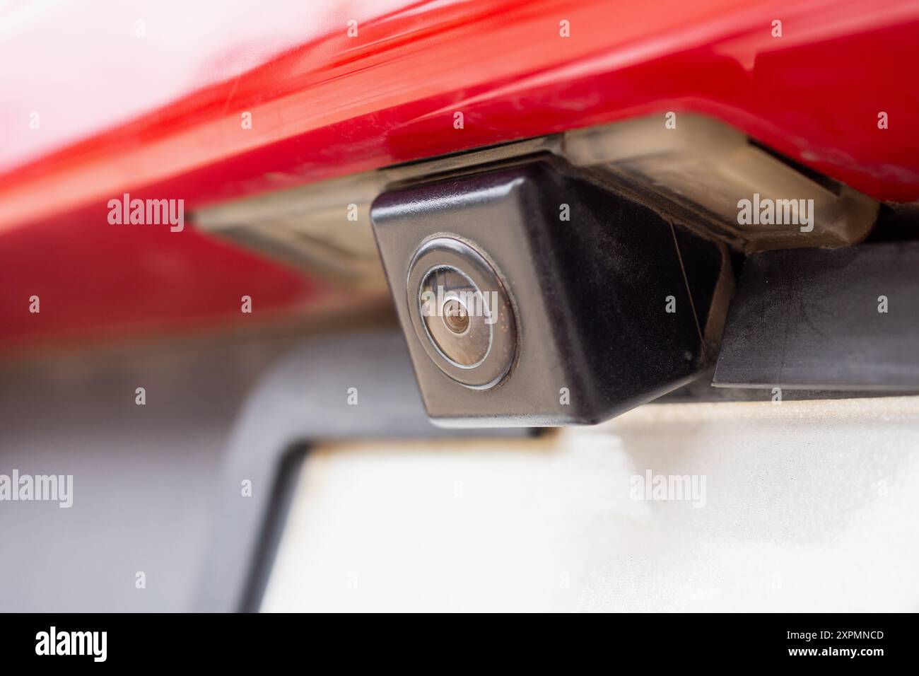 Red car rear view camera close up for parking assistance Stock Photo ...