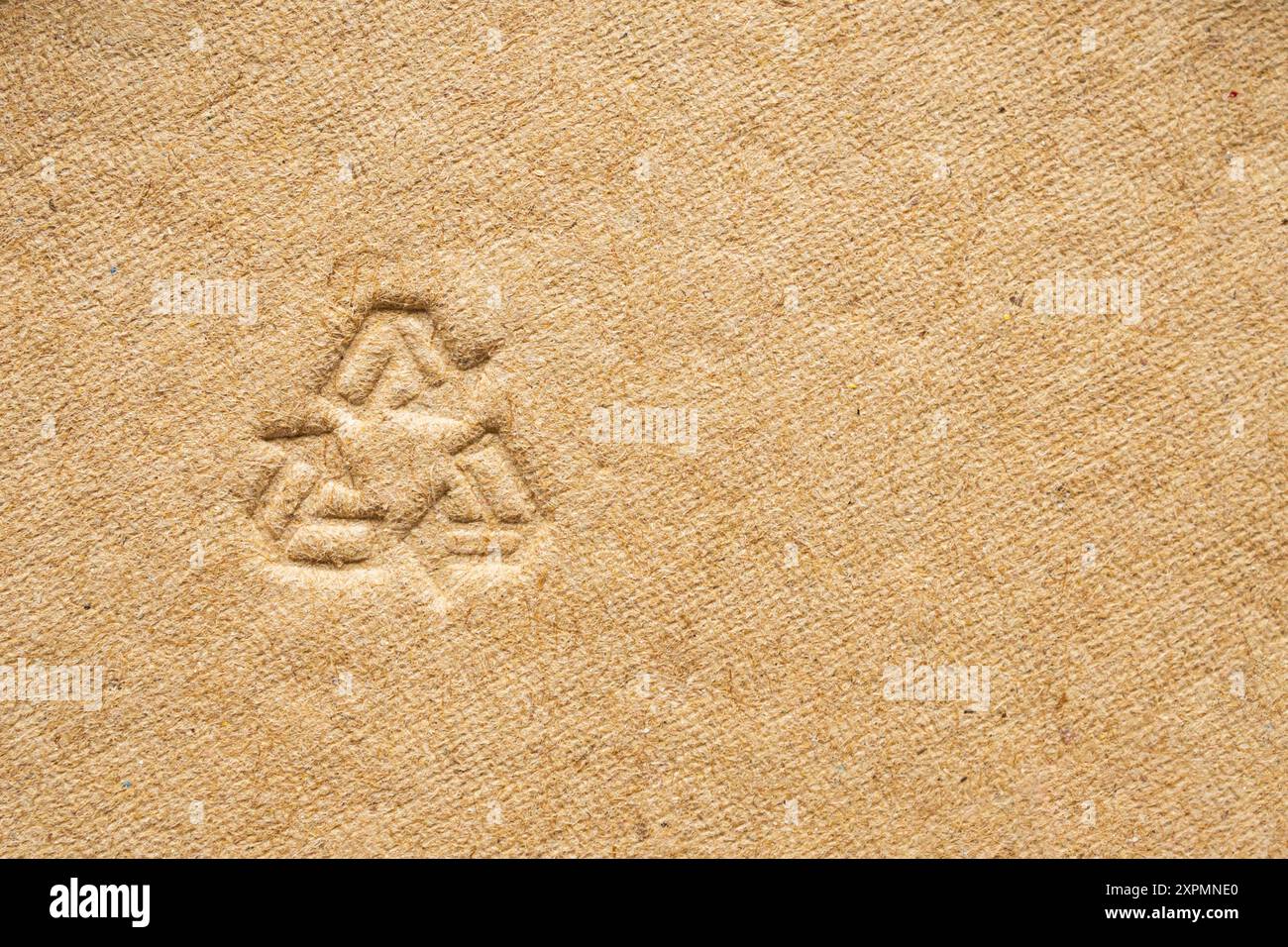 recycle sign on brown cardboard paper texture background Stock Photo ...