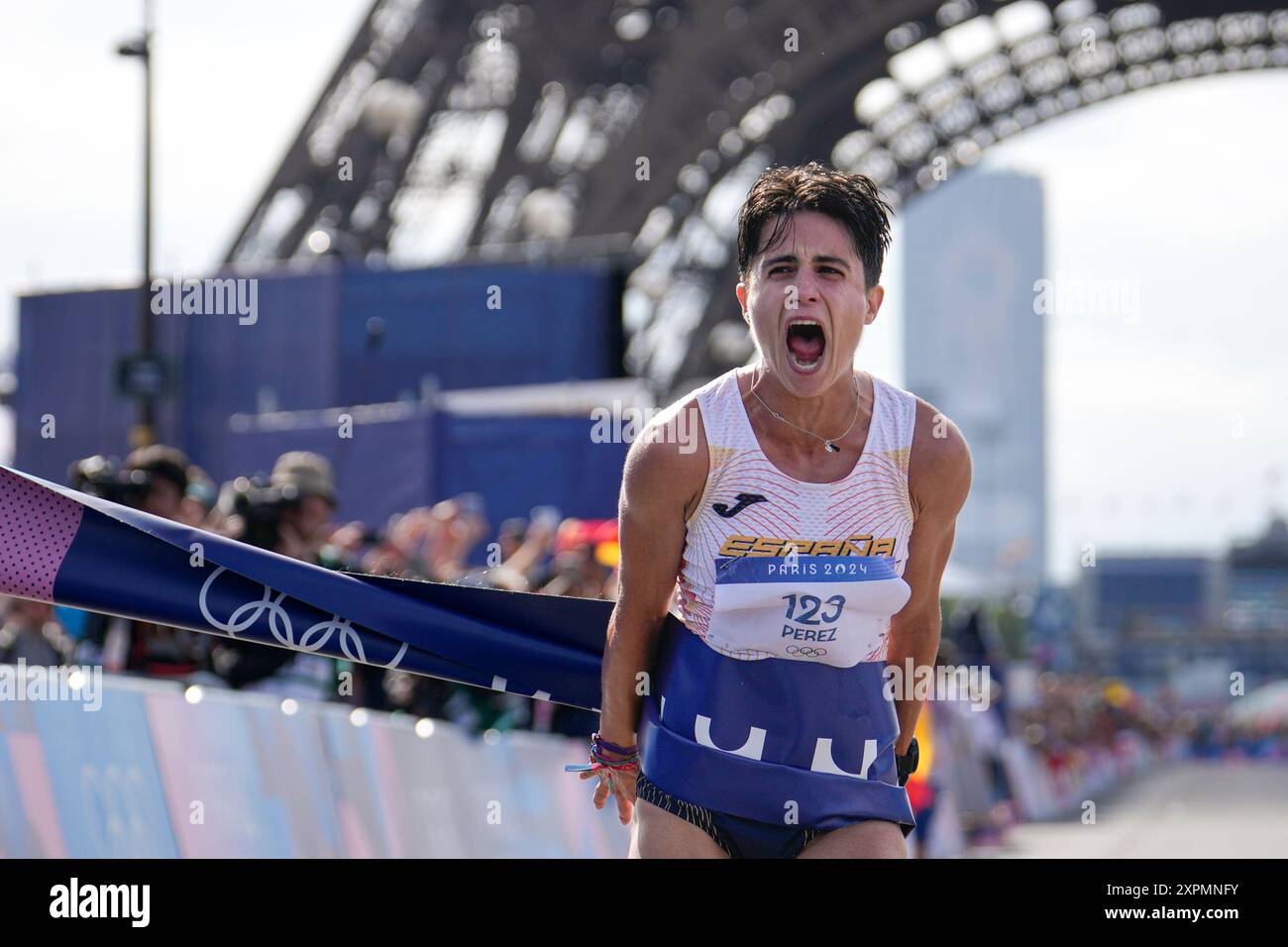 Spain's Maria Perez celebrates after crossing the finish line to win ...
