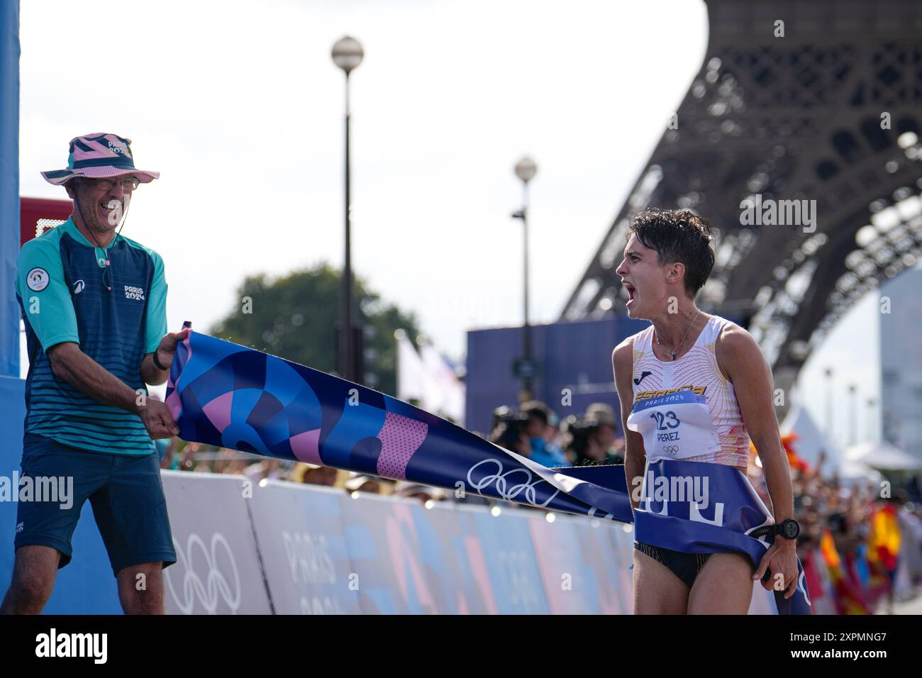 Spain's Maria Perez celebrates after crossing the finish line to win ...
