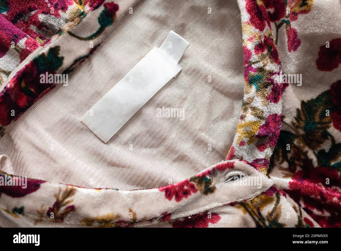 laundry care clothing label on fabric texture Stock Photo - Alamy
