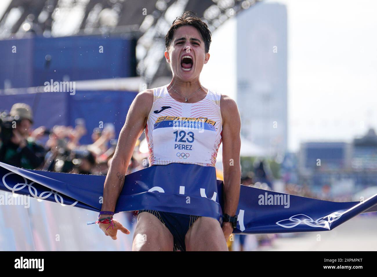 Spain's Maria Perez celebrates after crossing the finish line to win ...