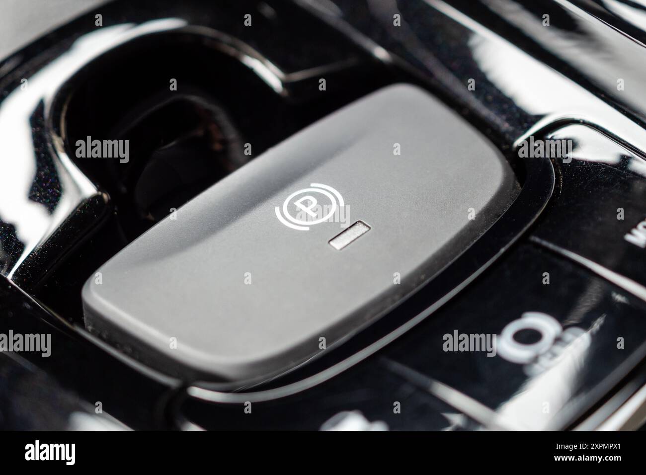 electronic handbrake button in luxury modern car Stock Photo - Alamy