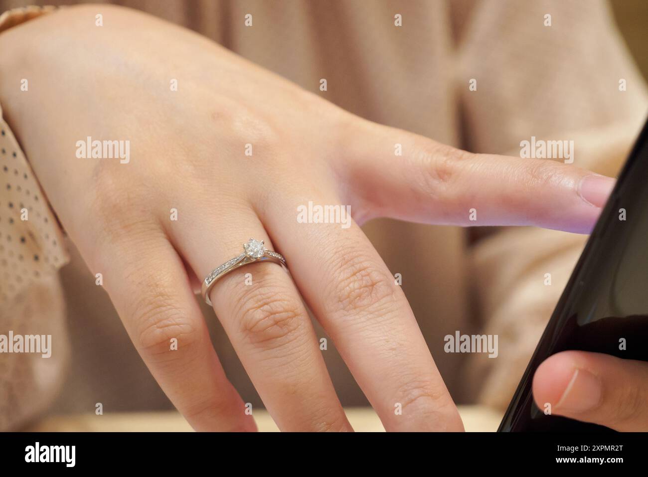 Closeup hand holding elegant diamond hi-res stock photography and images - Alamy