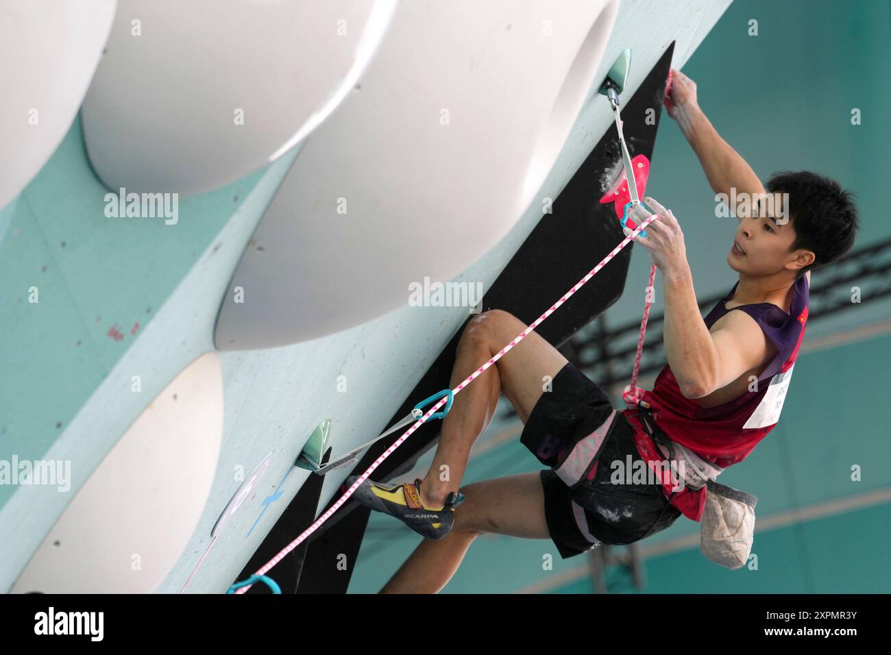Pan Yufei of China competes in the men's boulder and lead, semifinal ...