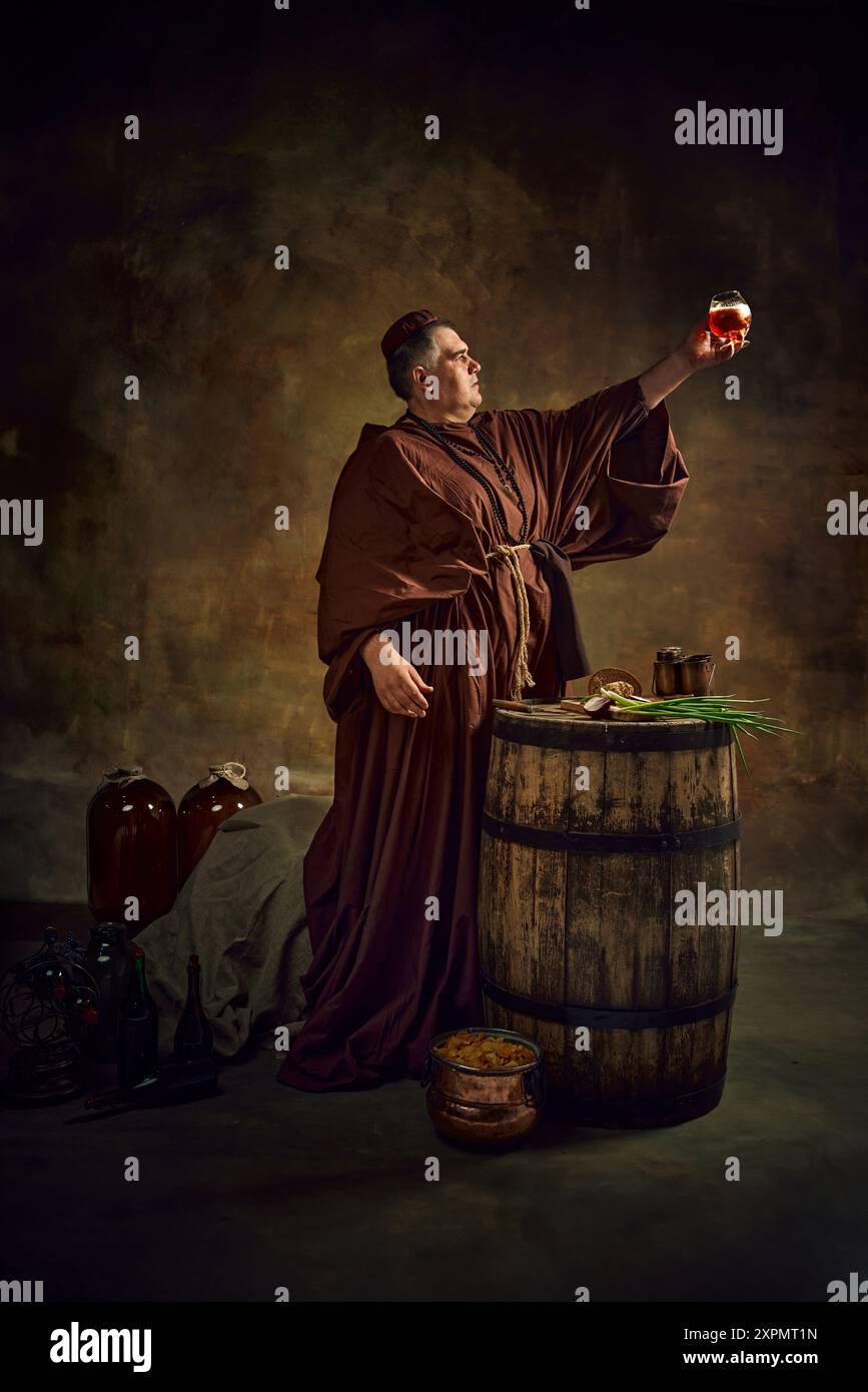 Dedication to abbey brewing through the ages. Medieval monk raising ...