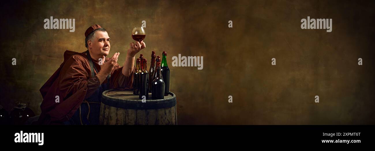 Deep history of monastic brewing. Man, medieval monk in robe raising ...