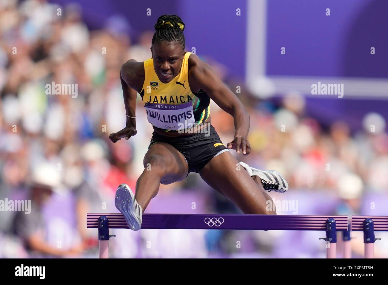 Danielle Williams, of Jamaica, competes in the women's 100-meter ...