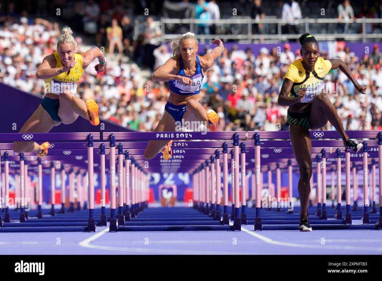 Ackera Nugent, right, of Jamaica, Lotta Harala, of Finland, Liz Clay ...