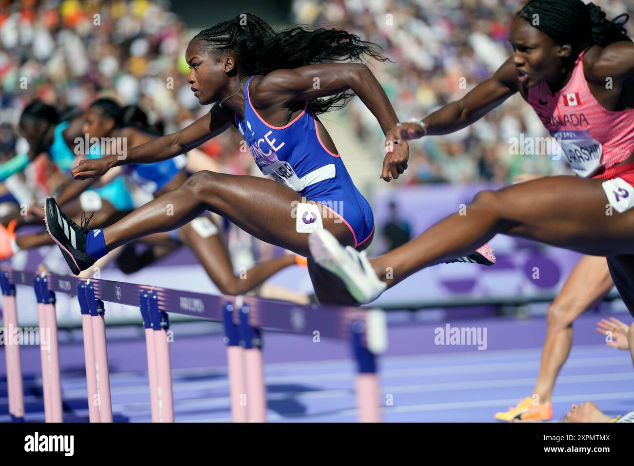 Cyrena Samba-Mayela, of France, competes during a heat in the women's ...