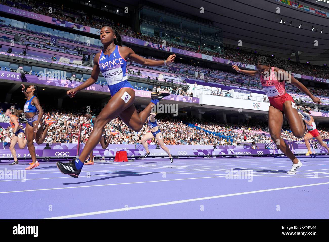 Cyrena Samba-Mayela, of France, crosses the finish line ahead of Mariam ...