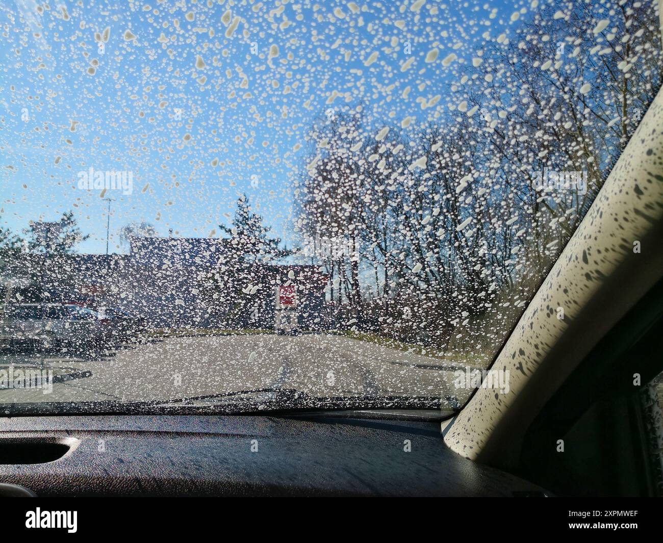 Car wash foam on a windshield, view from inside car. Auto Wash. Washing ...
