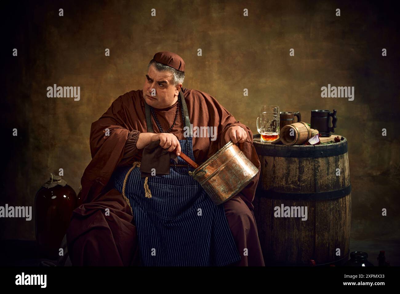 Process of monastic brewing. Medieval monk stirring copper pot, craft ...