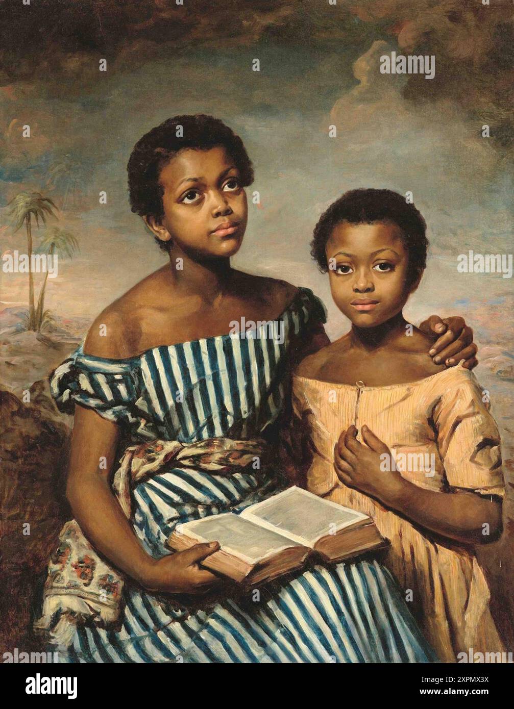 Two Children with a Book - Two young Black girls sit together with a ...