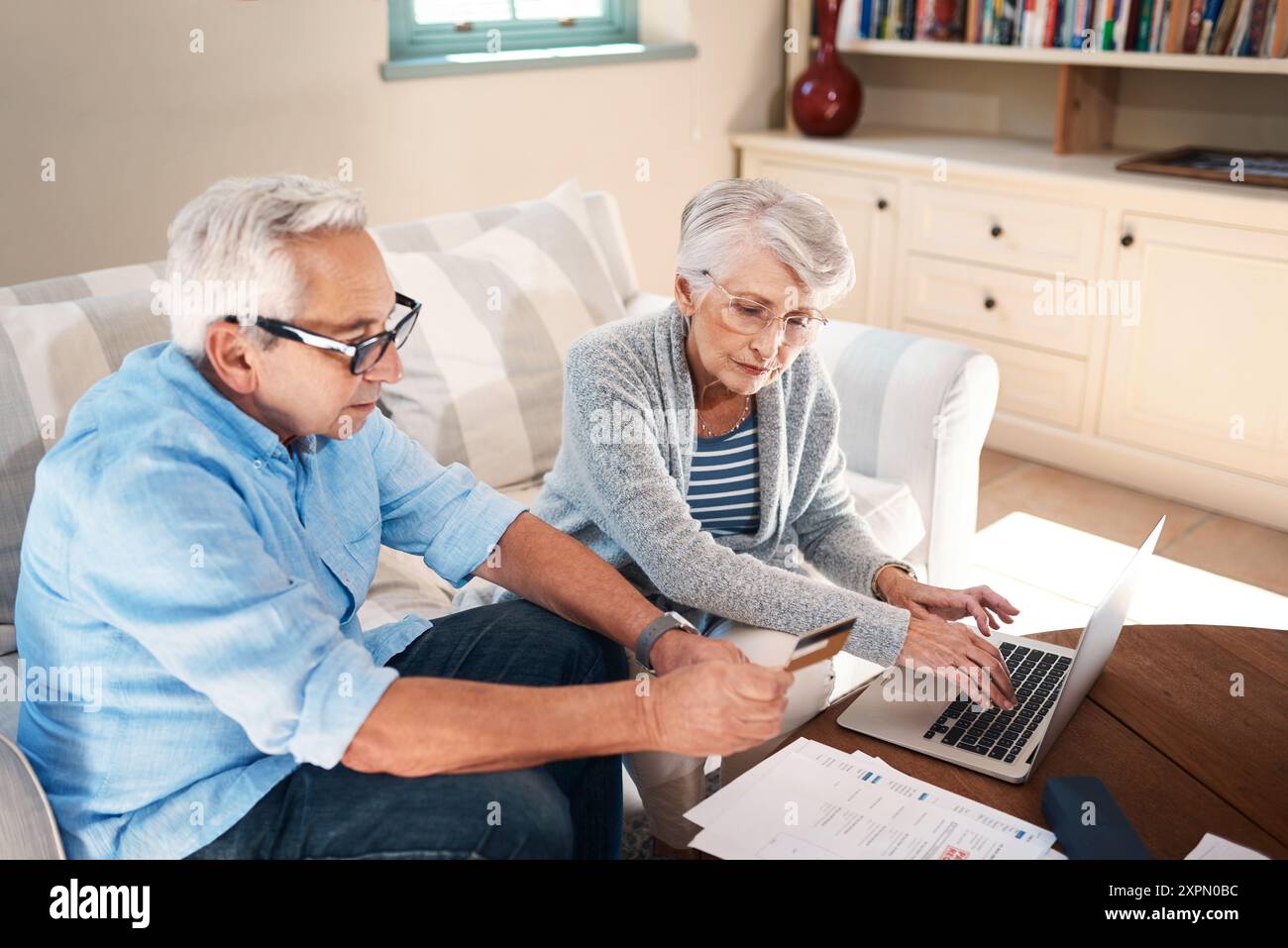 Old couple, credit card or password on laptop for mortgage payment with ...