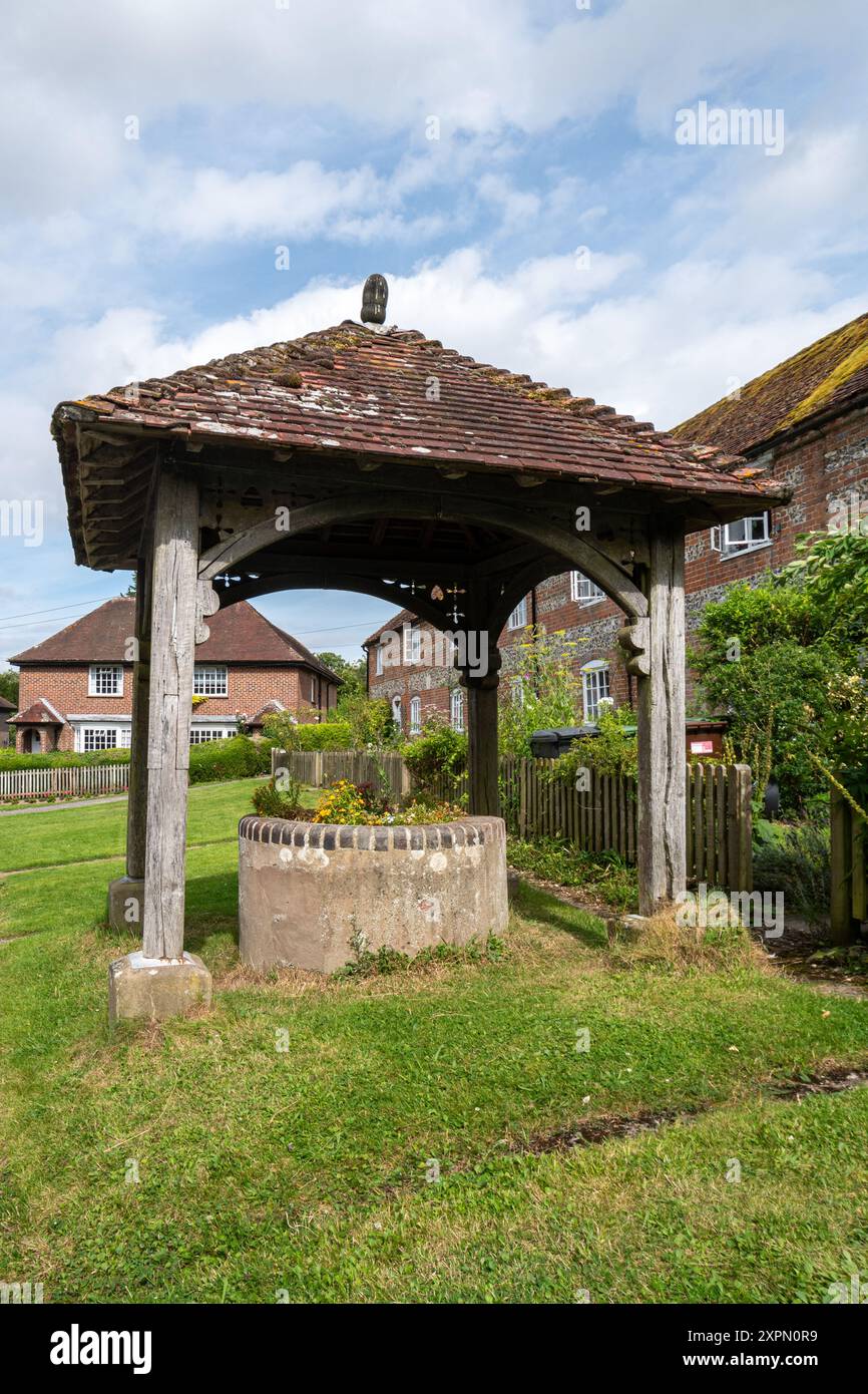 Village well in Avington, Hampshire, England, UK, in front of 18th ...
