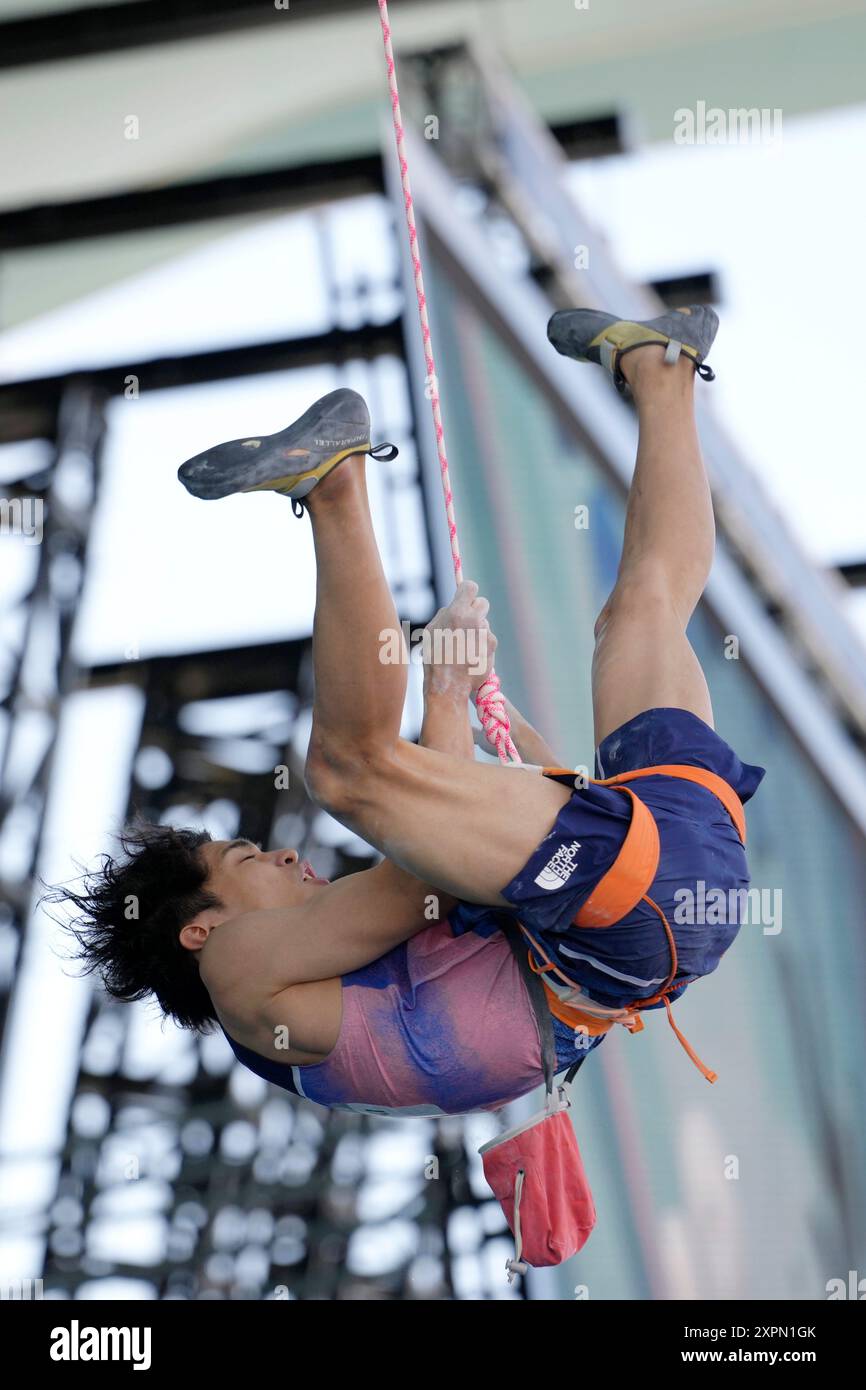 Tomoa Narasaki of Japan competes in the men's boulder and lead ...