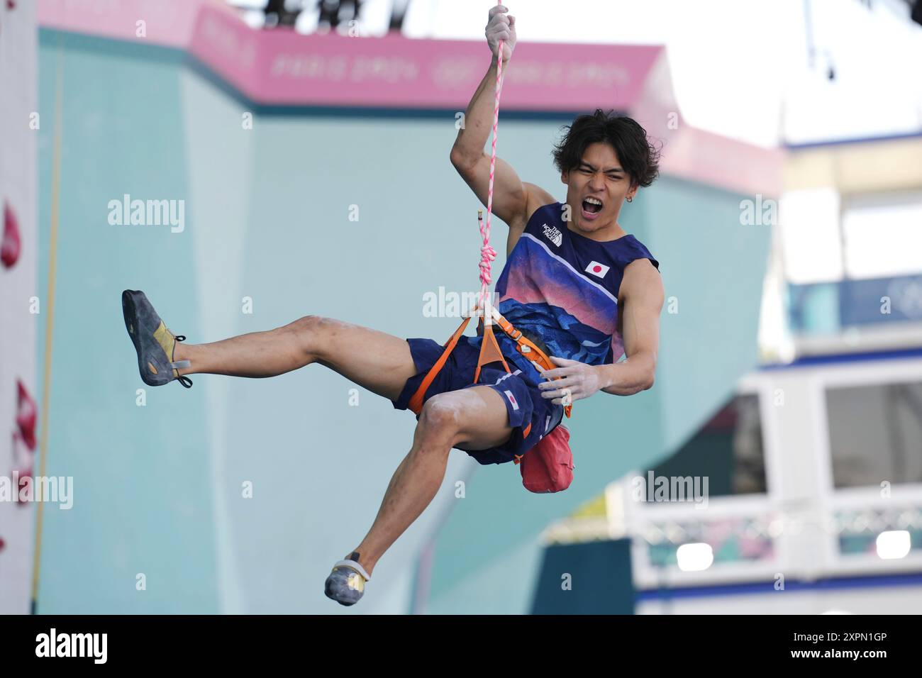 Tomoa Narasaki of Japan competes in the men's boulder and lead ...