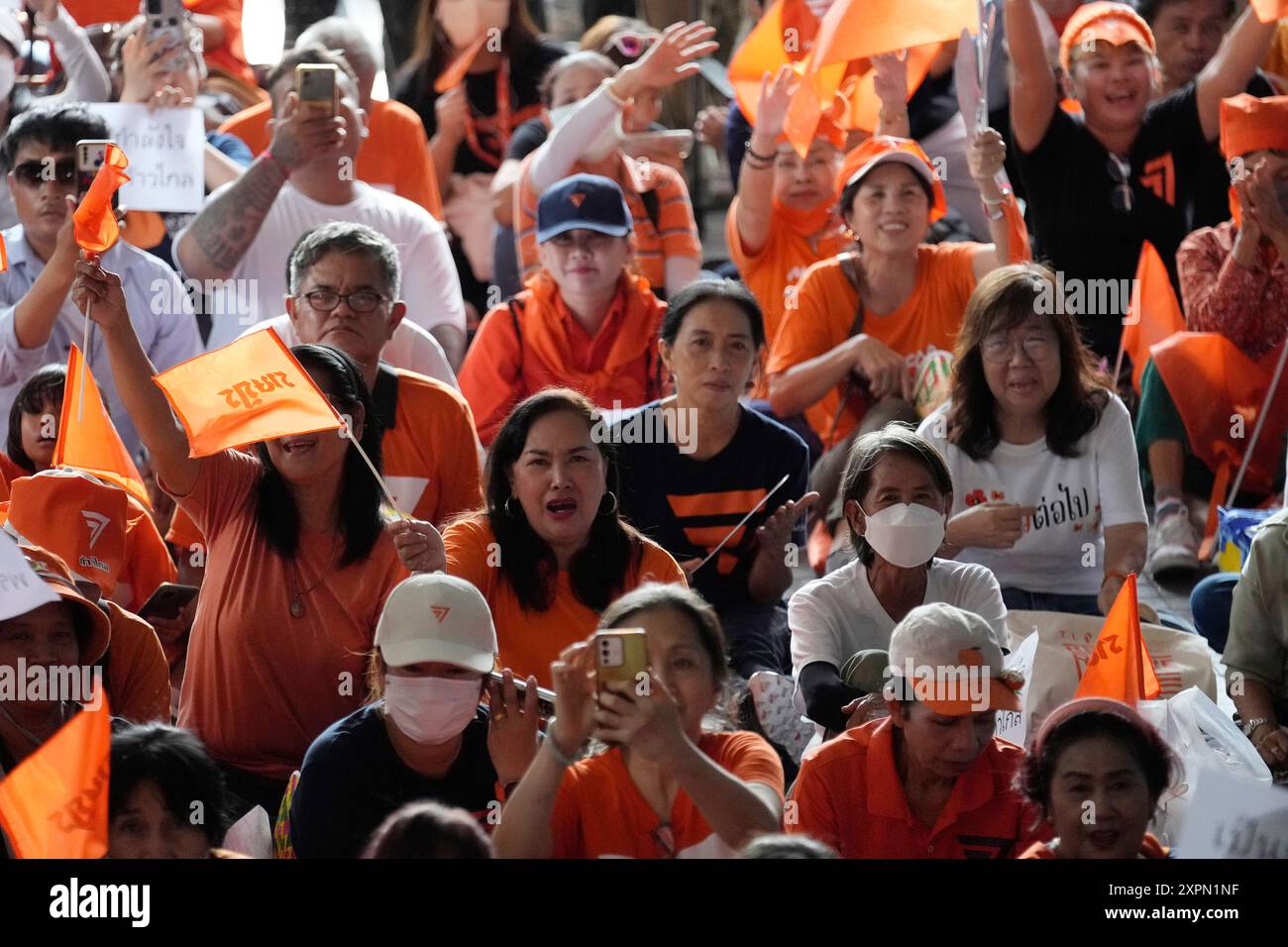 Supporter of Move Forward Party cheer at the headquarters in Bangkok, Thailand, Wednesday, Aug ...