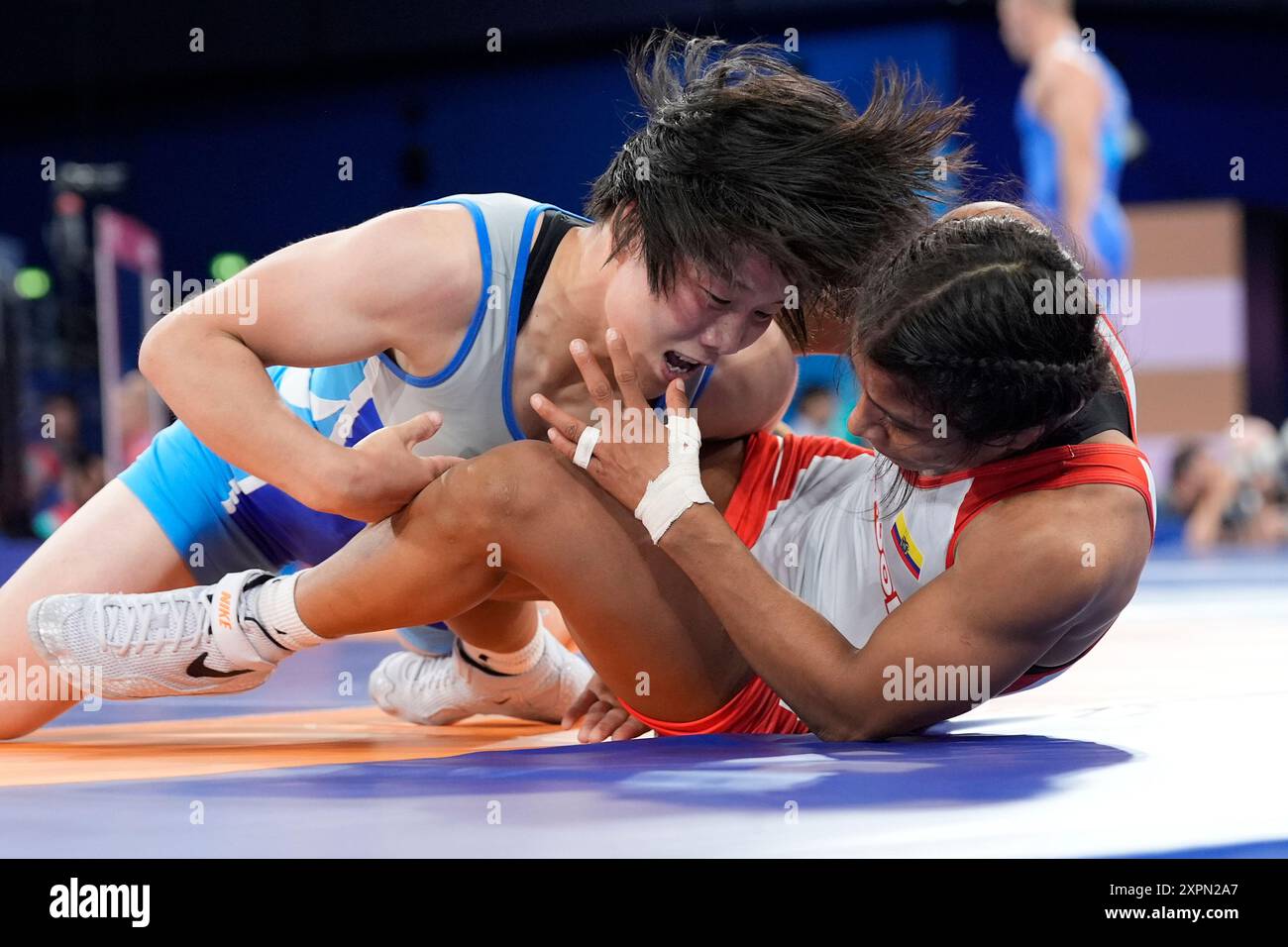 Ecuador's Lucia Yamileth Yepez Guzman and North Korea's Hyo Gyong Choe ...